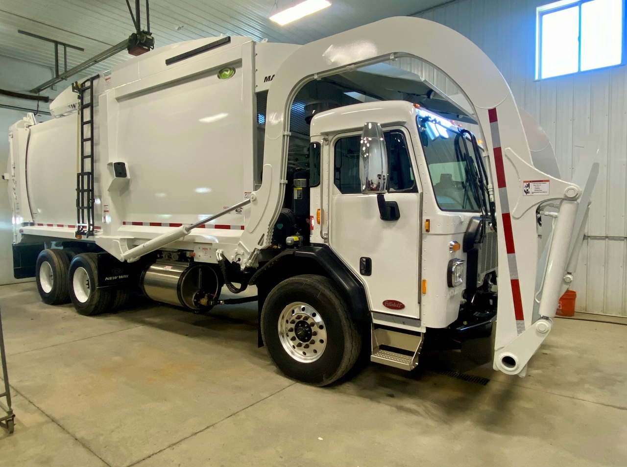 Coming In – New 2025 Peterbilt 520 | Olympic Sales, Inc.